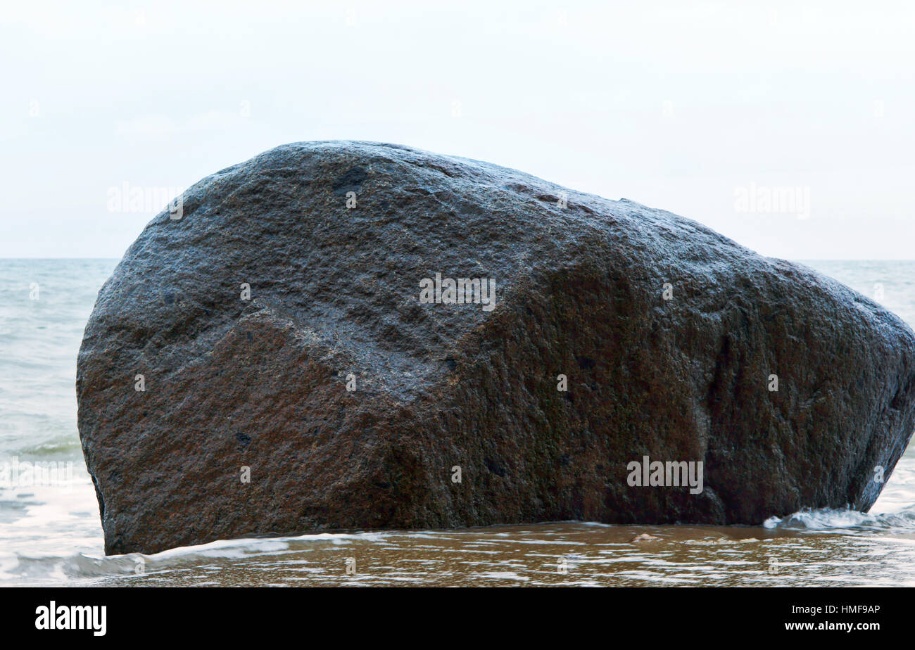 a huge stone boulder on the shore of the sea Stock Photo - Alamy