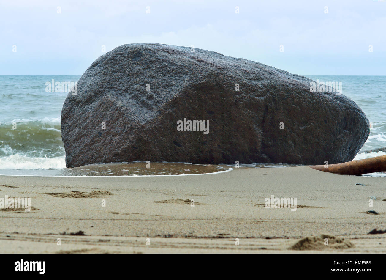 a huge stone boulder on the shore of the sea Stock Photo - Alamy