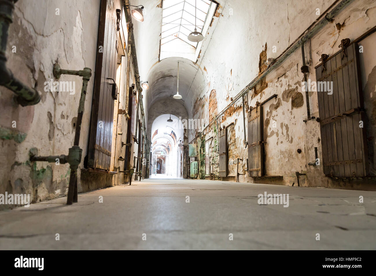 Jail hallway with locked doors. Inside prison museum Stock Photo - Alamy