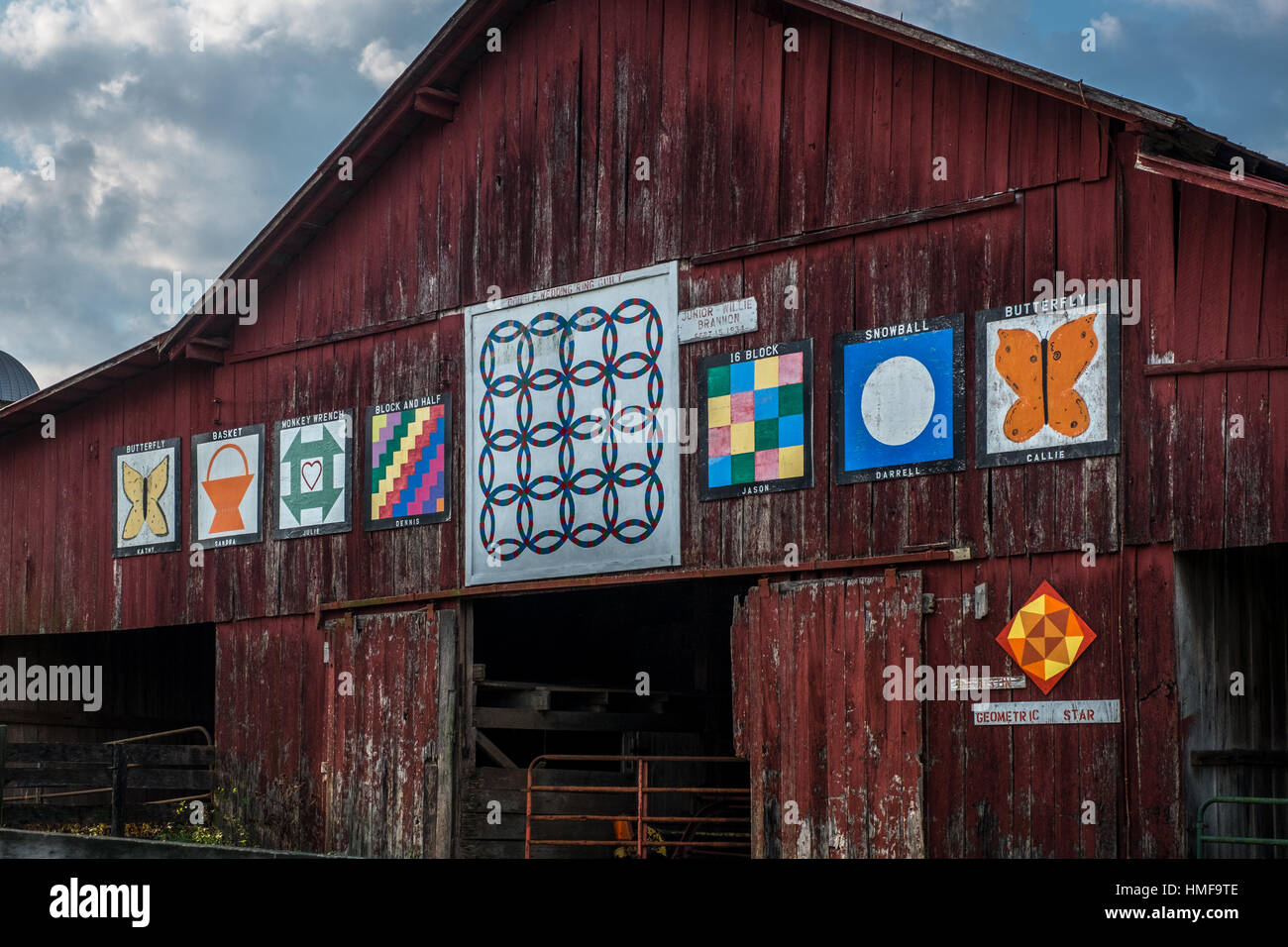Rustic Red Barn with Multiple Quilts Stock Photo - Alamy