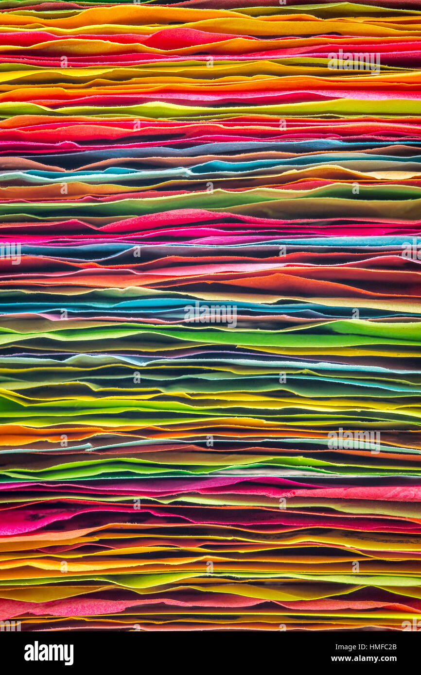 stack of colorful sticky notes - side view of rough paper edges Stock ...