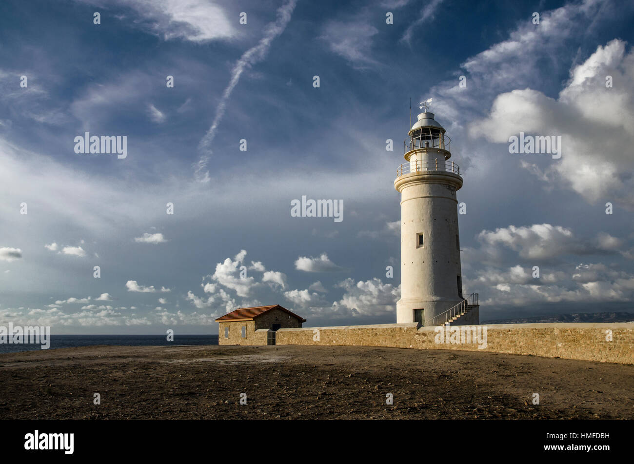 Sunset at Paphos Lighthouse at Paphos Archaeological Park Stock Photo ...