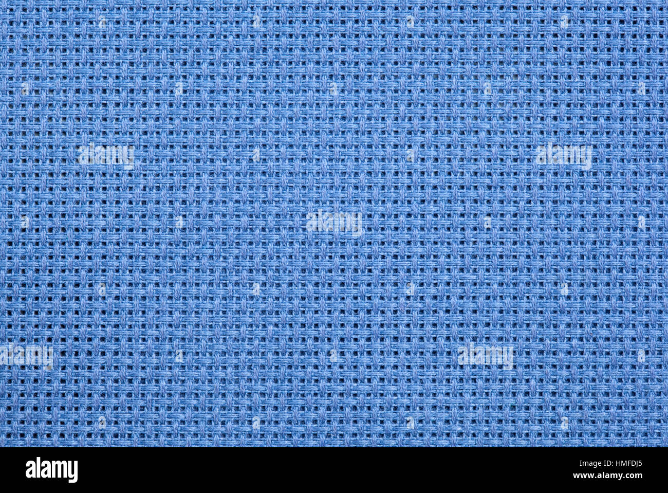 Blue aida cloth used for cross stitch Stock Photo - Alamy