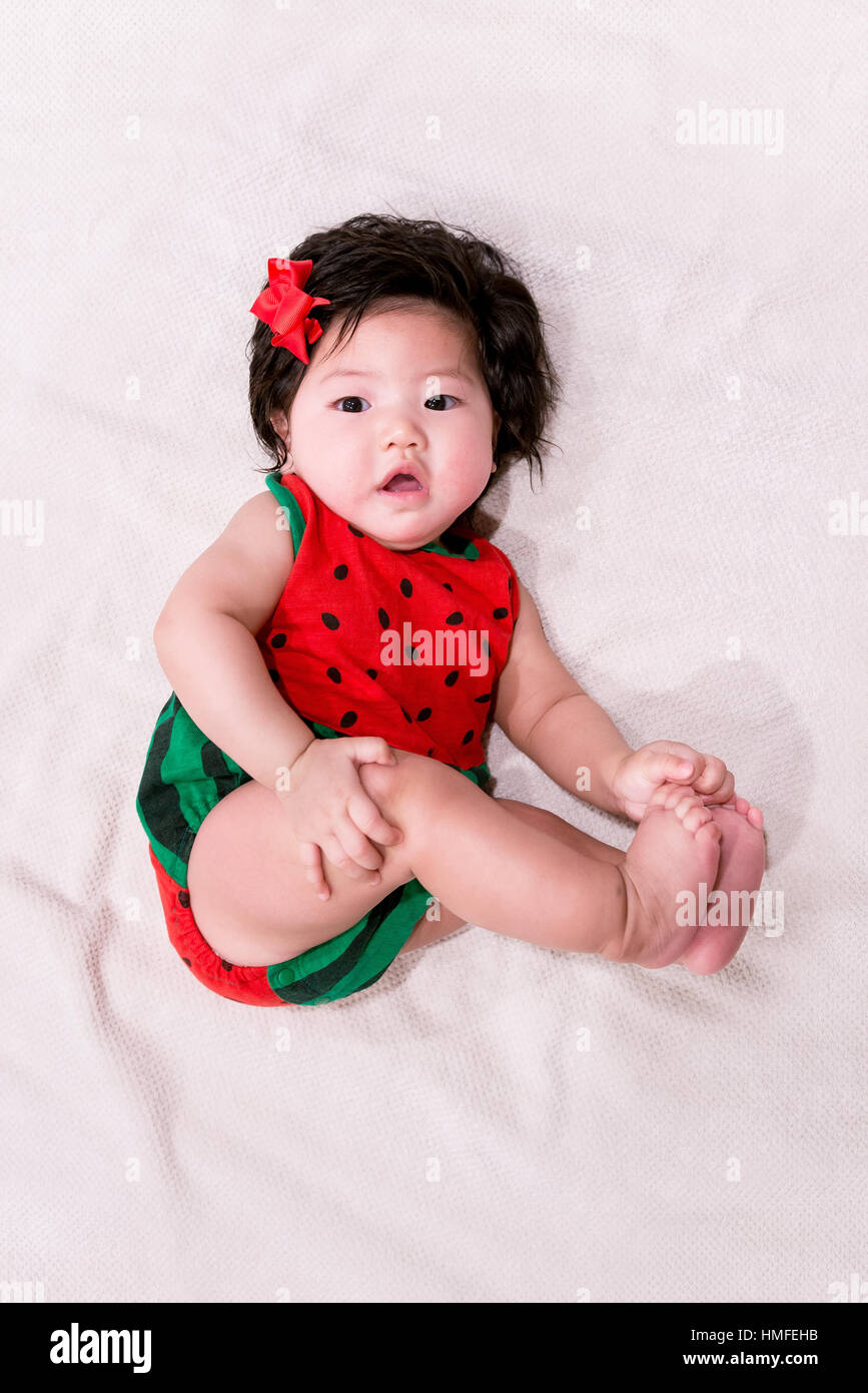 baby girl with cute watermelon outfit and white background Stock Photo ...