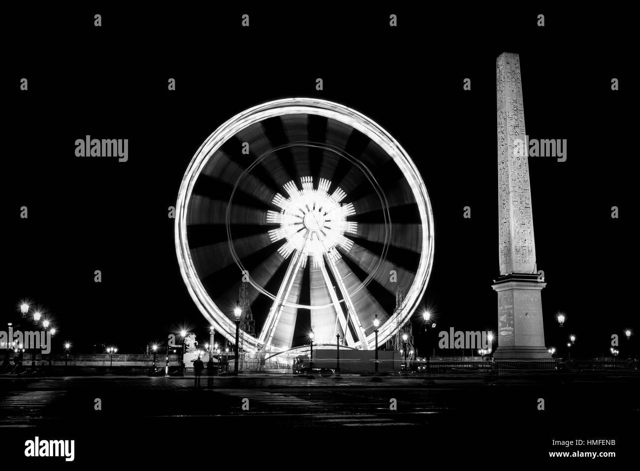 Ferris wheel in Paris night scene long exposure Stock Photo - Alamy