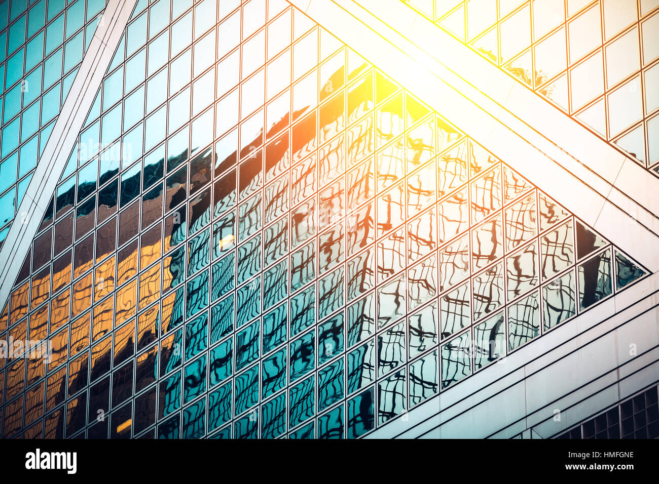 Modern office building with sun ray reflection from corner Stock Photo ...
