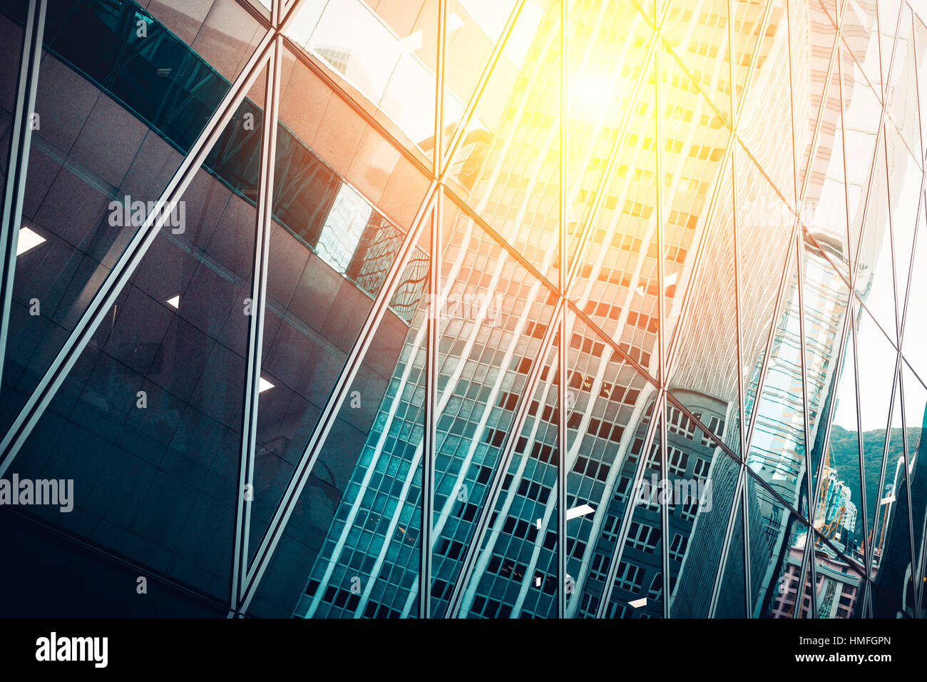 Modern office building with sun ray reflection from corner Stock Photo ...