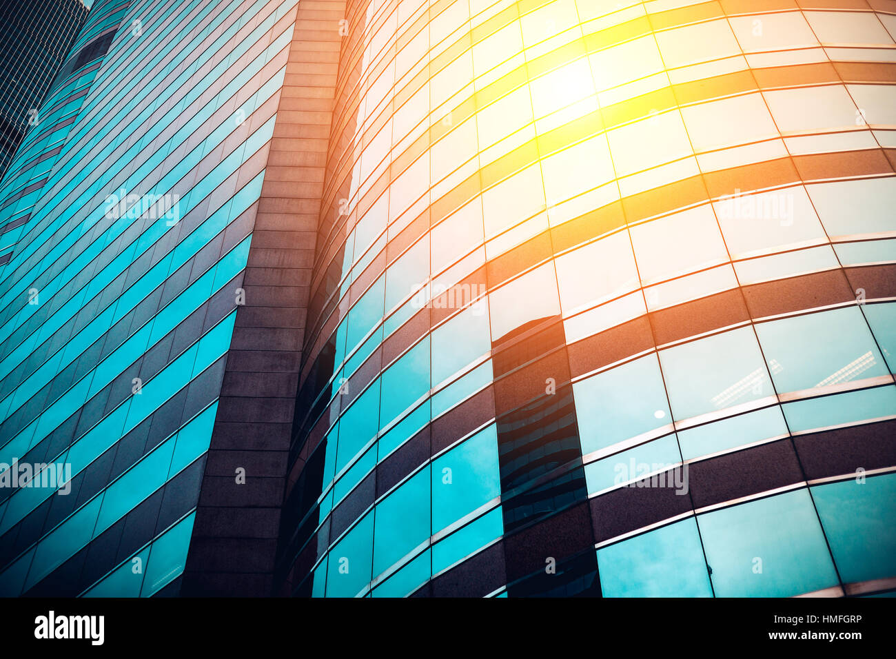 Modern office building with sun ray reflection from corner Stock Photo ...