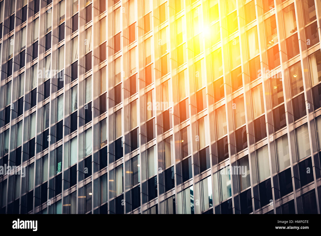 Modern office building with sun ray reflection from corner Stock Photo ...