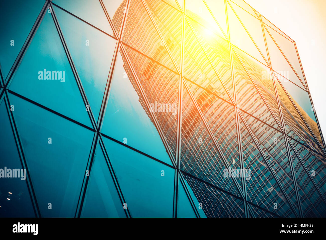 Modern office building with sun ray reflection from corner Stock Photo ...