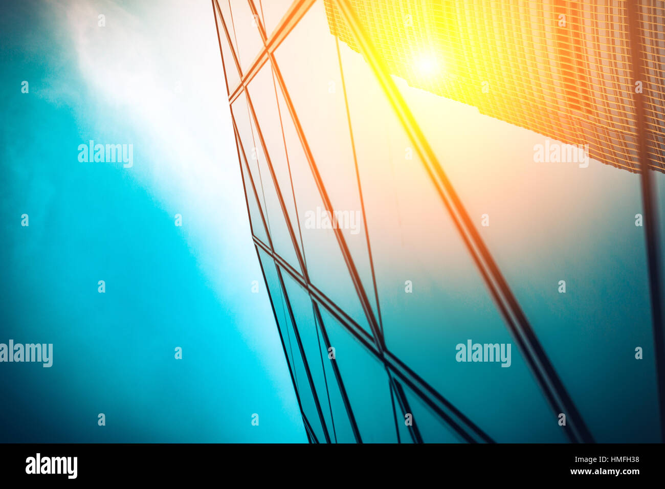 Modern office building with sun ray reflection from corner Stock Photo ...