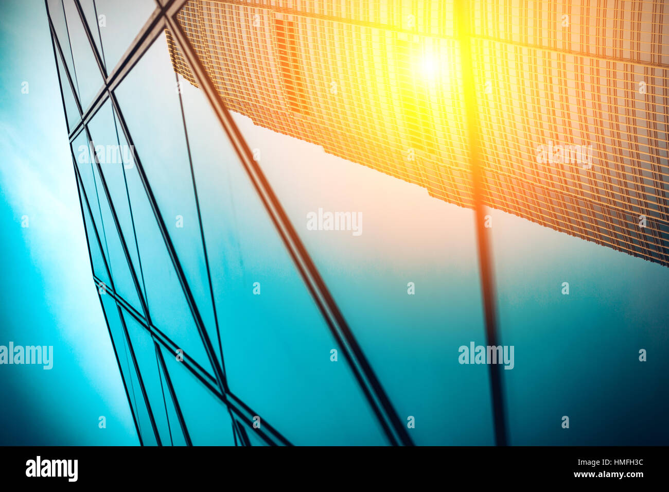 Modern office building with sun ray reflection from corner Stock Photo ...