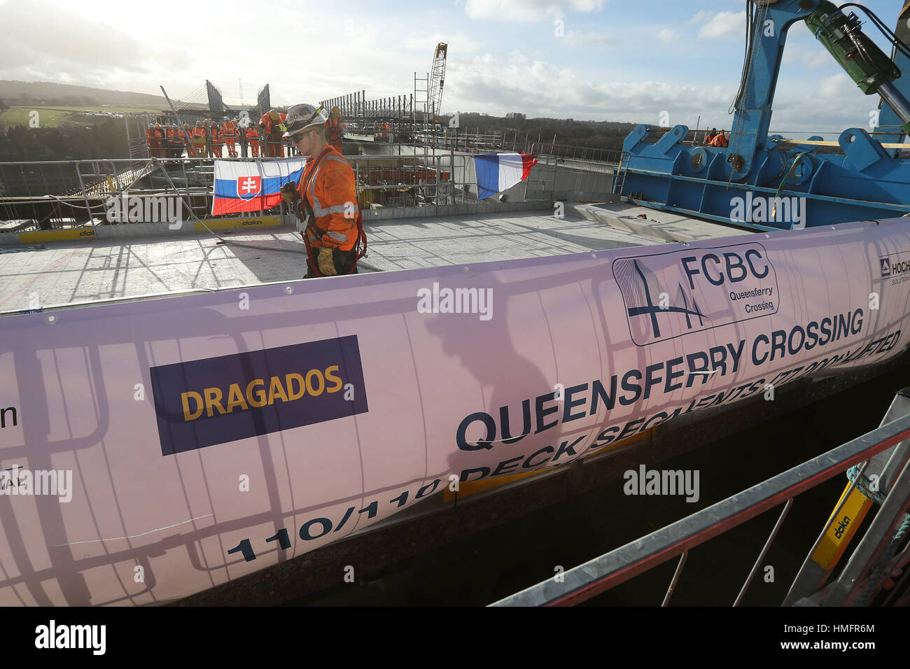 The final section of the new Queensferry Crossing bridge is lifted into ...