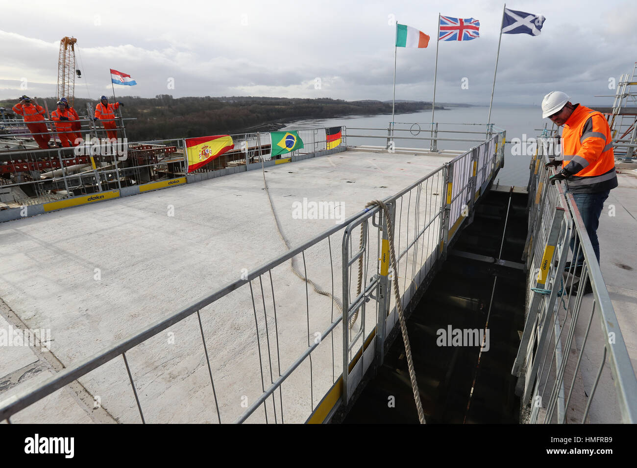 The final section of the new Queensferry Crossing bridge is lifted into ...