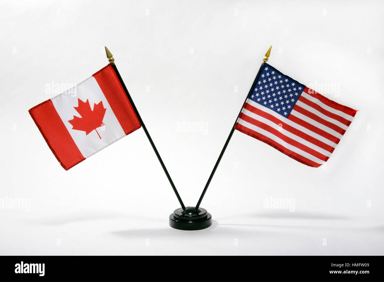 Canadian and american flags side by side hi-res stock photography and ...