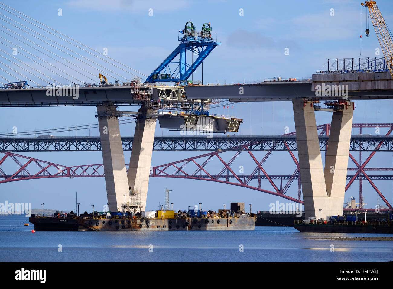 The final section of the new Queensferry Crossing bridge is lifted into ...
