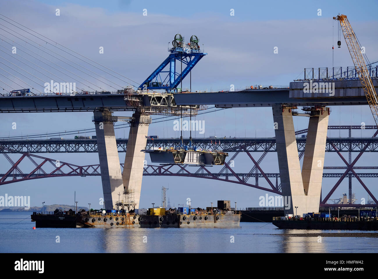 The final section of the new Queensferry Crossing bridge is lifted into ...