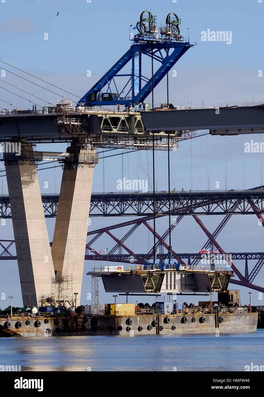 The final section of the new Queensferry Crossing bridge is lifted into ...