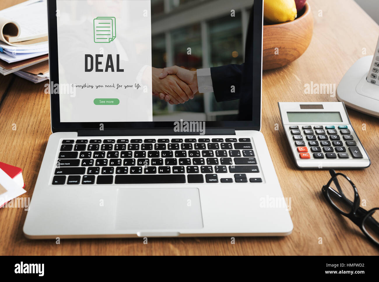 Deal word on business handshake background Stock Photo - Alamy