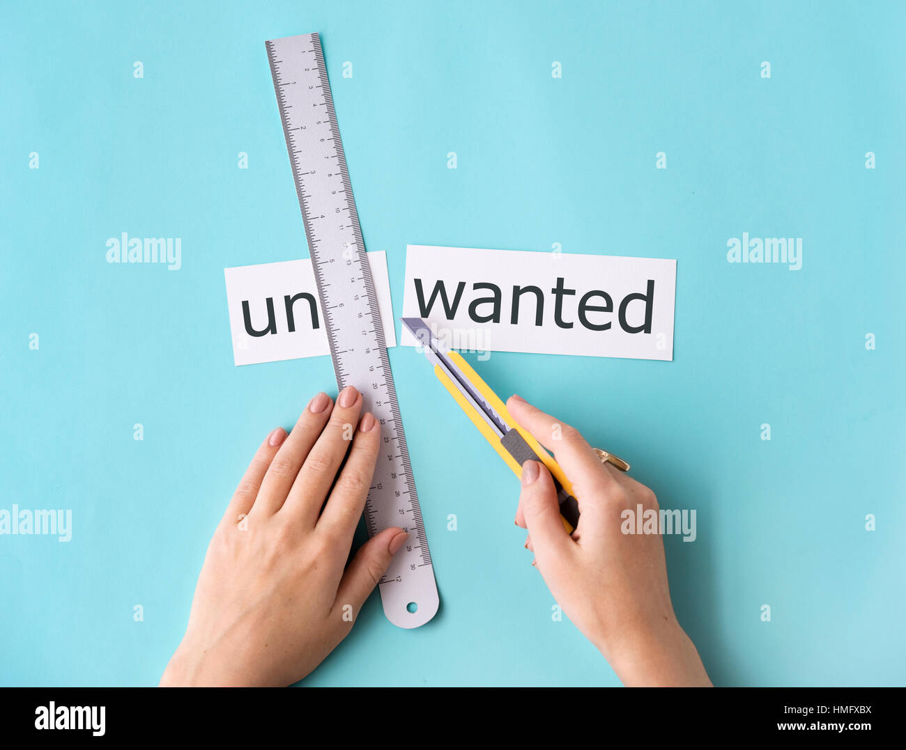 Unnecessary Unwanted Hands Cut Word Split Concept Stock Photo - Alamy