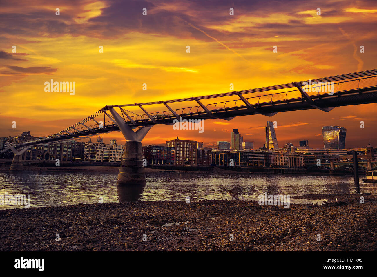 London Millennium bridge sunset skyline in UK at dusk Stock Photo - Alamy