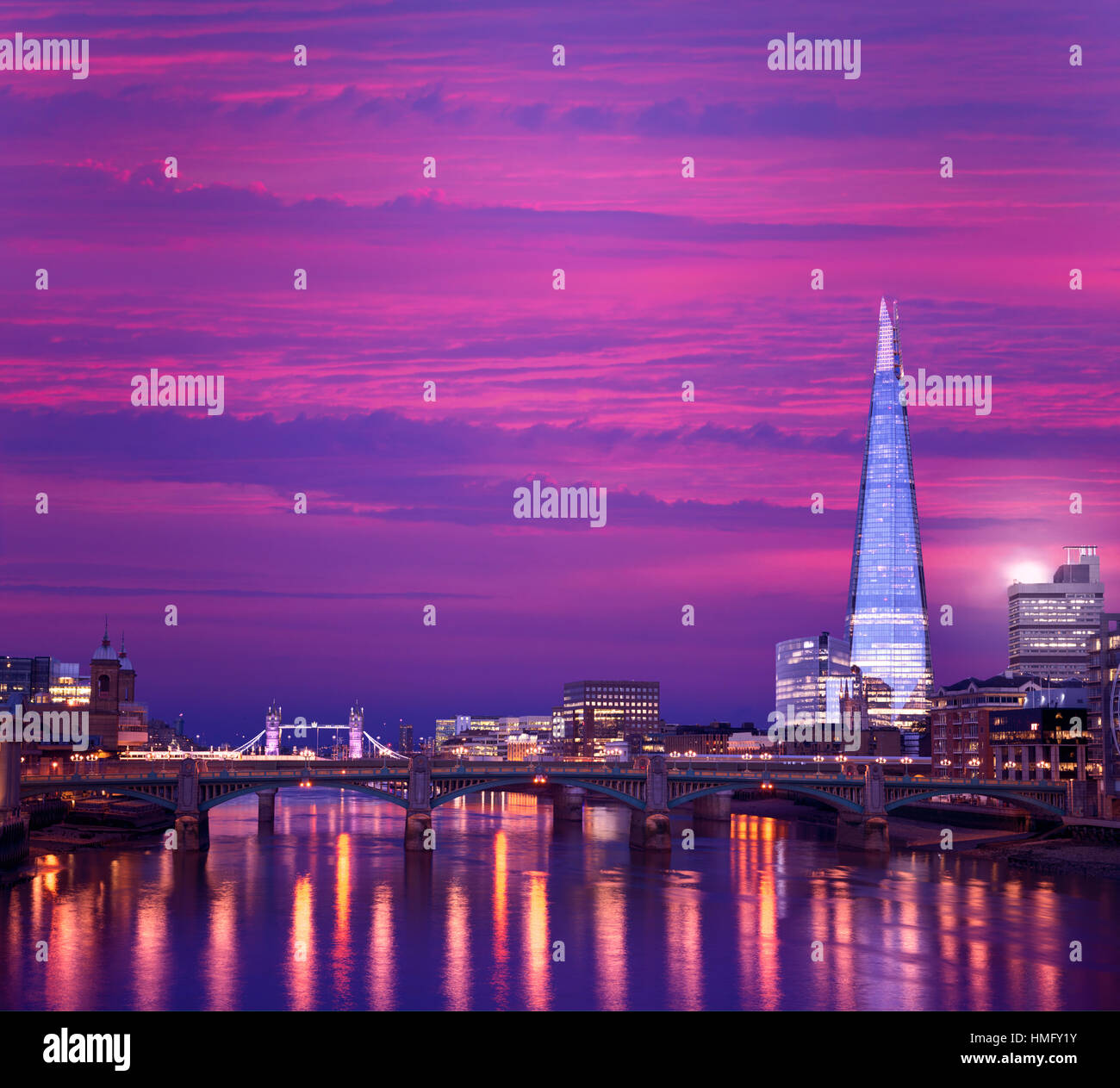London skyline sunset on Thames river reflection at UK Stock Photo - Alamy