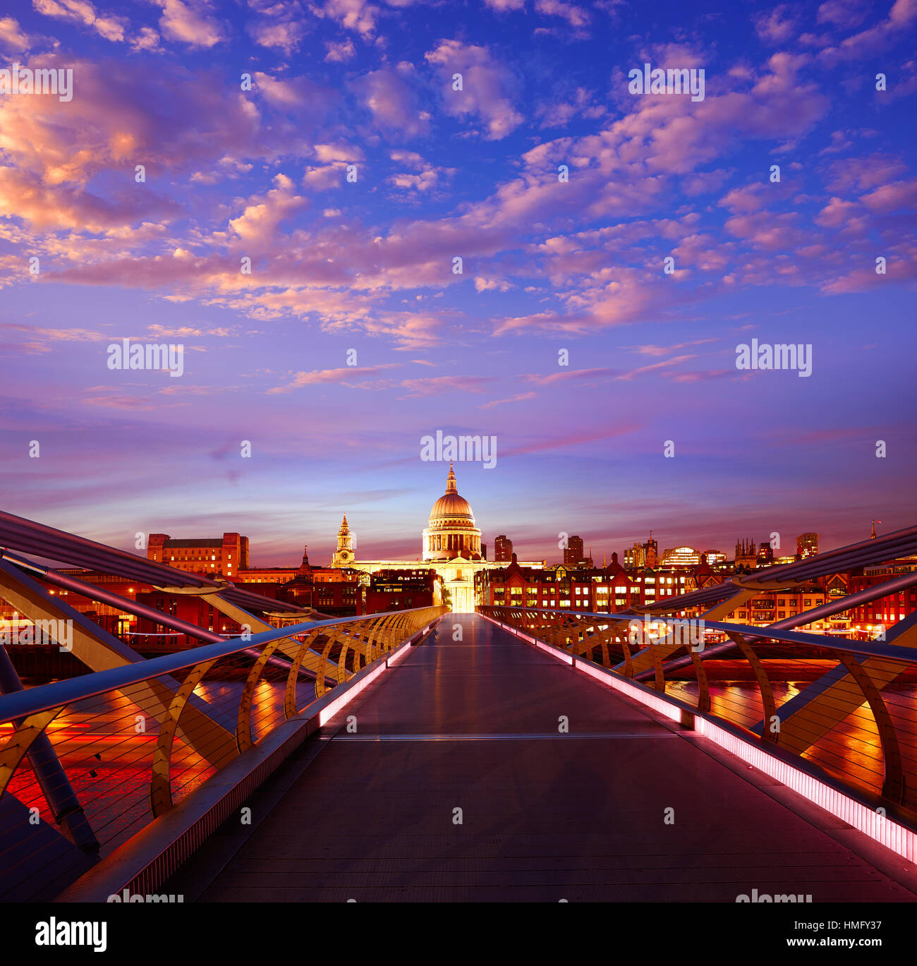 London Millennium bridge sunset skyline in UK at dusk Stock Photo - Alamy