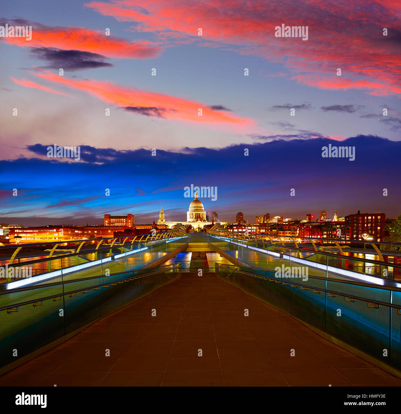 London Millennium bridge sunset skyline in UK at dusk Stock Photo - Alamy