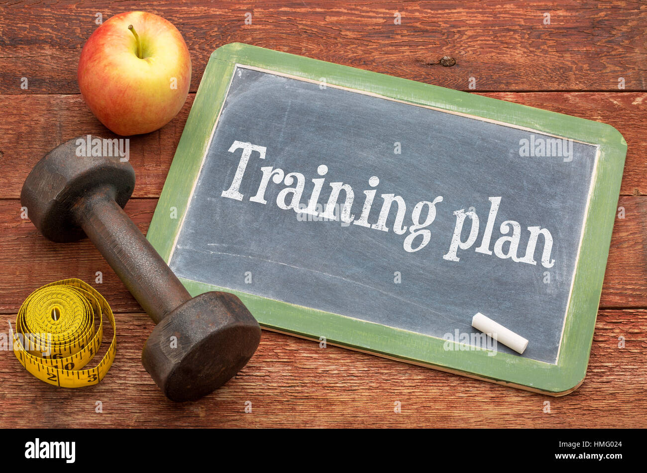 Training plan - slate blackboard sign against weathered red painted ...