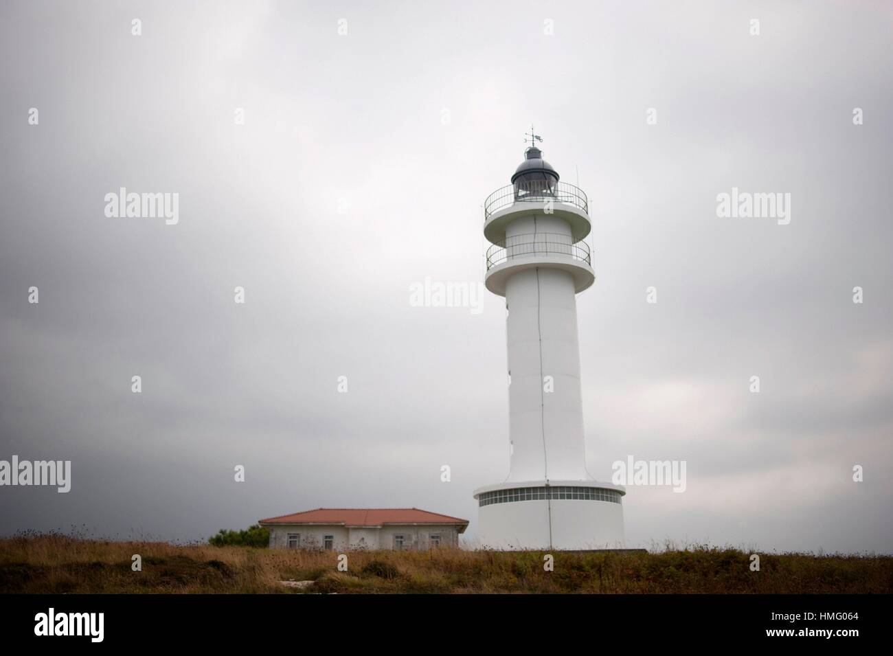 Lighthouse in Ajo town in Cantabrian coast Stock Photo - Alamy