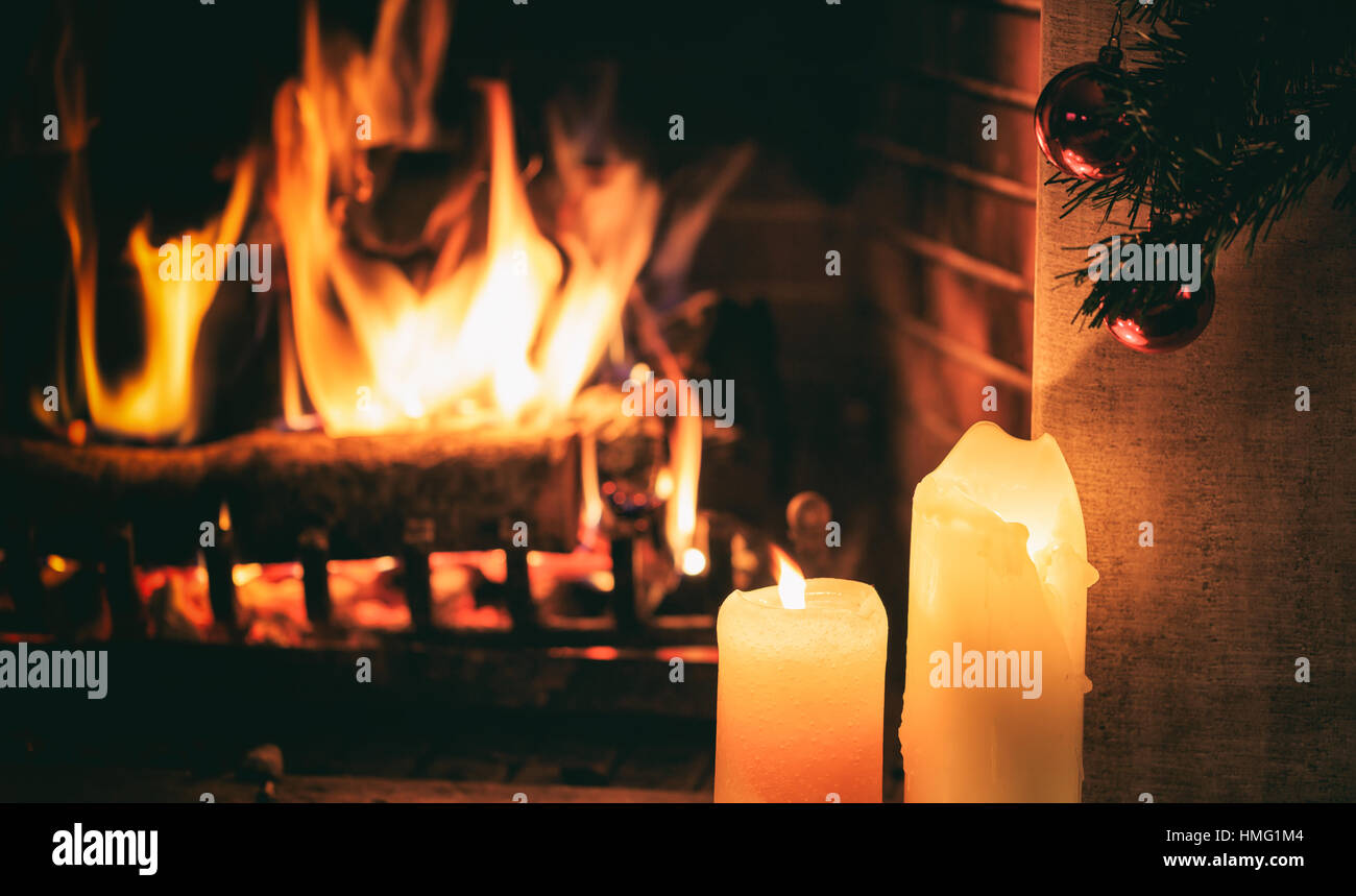 Burning logs in a fireplace Stock Photo - Alamy