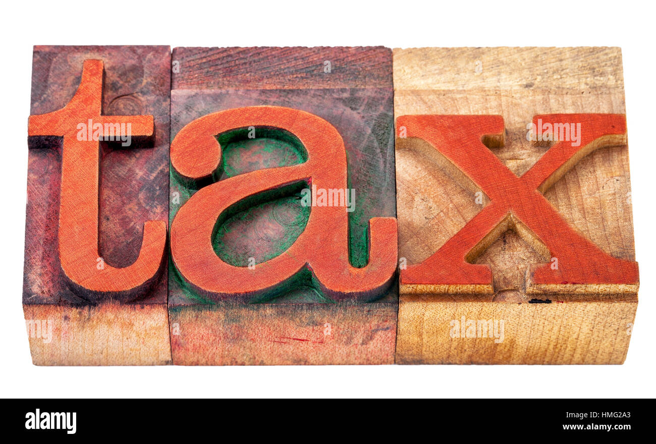 tax word abstract in vintage wood letterpress printing blocks, stained ...