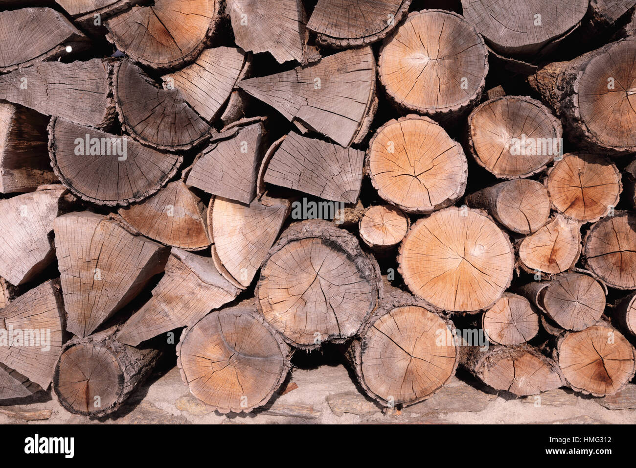 pattern of brown wood log background texture. Pile of wood logs ...