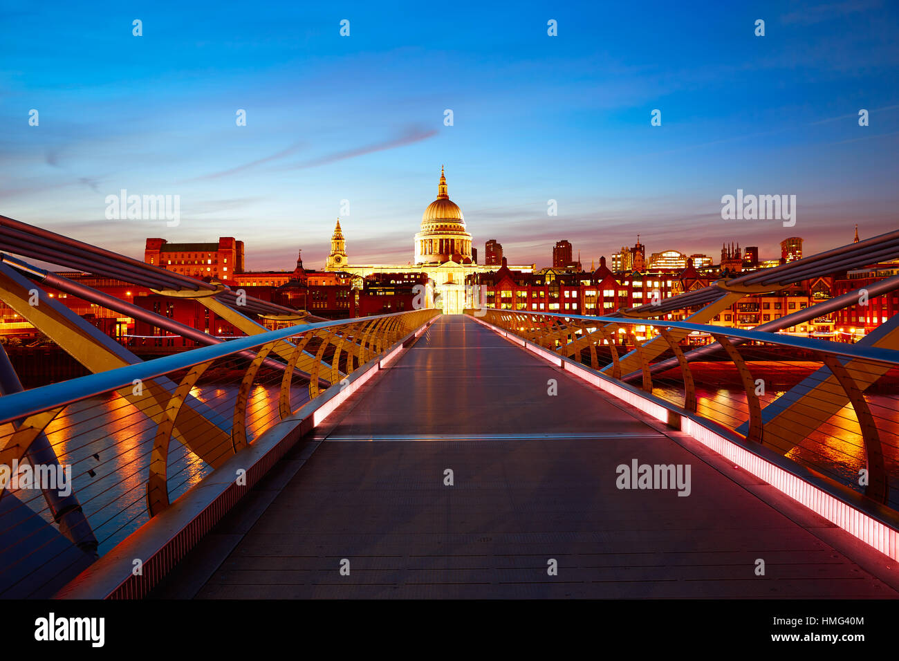 London Millennium bridge sunset skyline in UK at dusk Stock Photo - Alamy