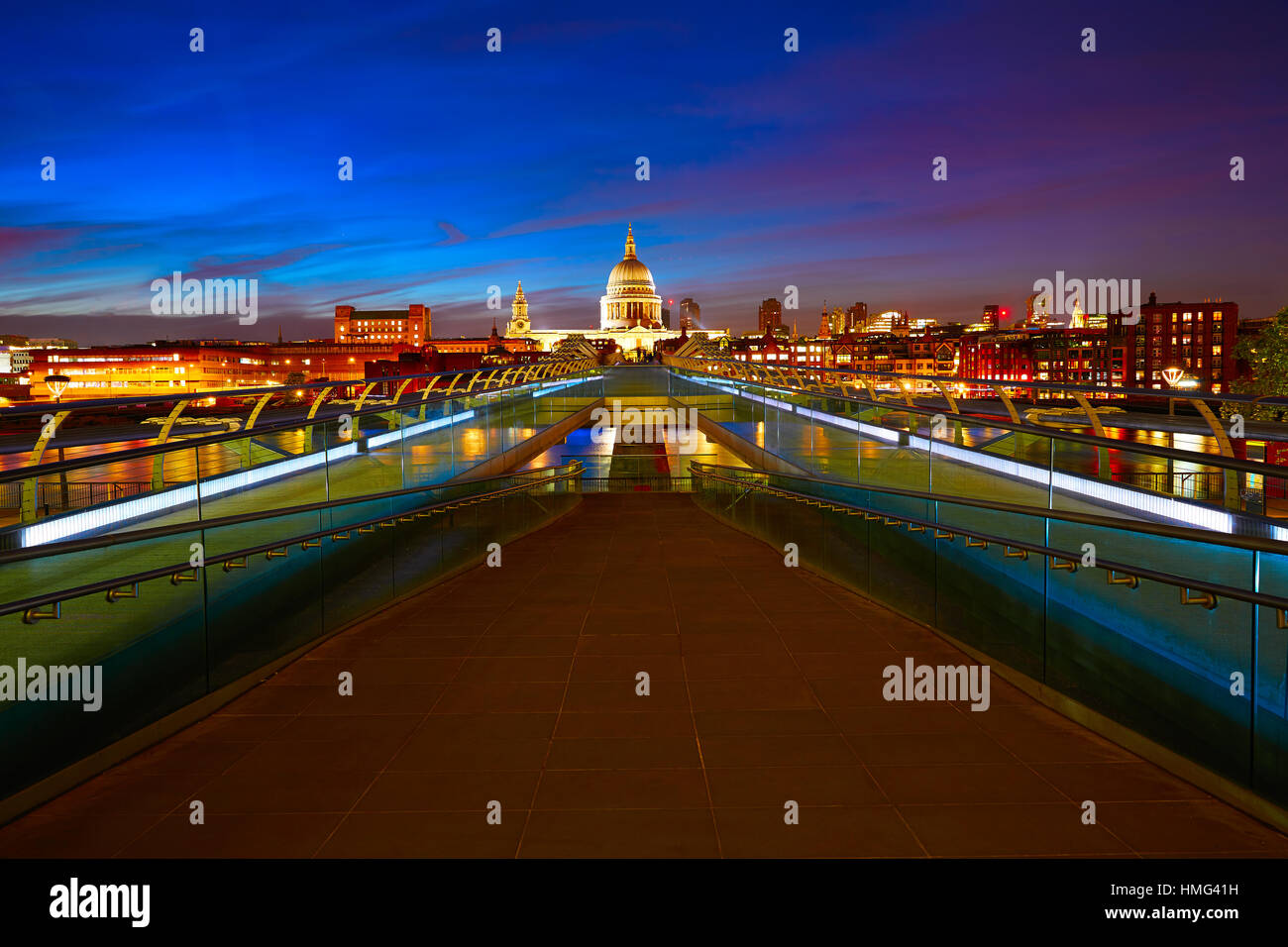 London Millennium bridge sunset skyline in UK at dusk Stock Photo - Alamy