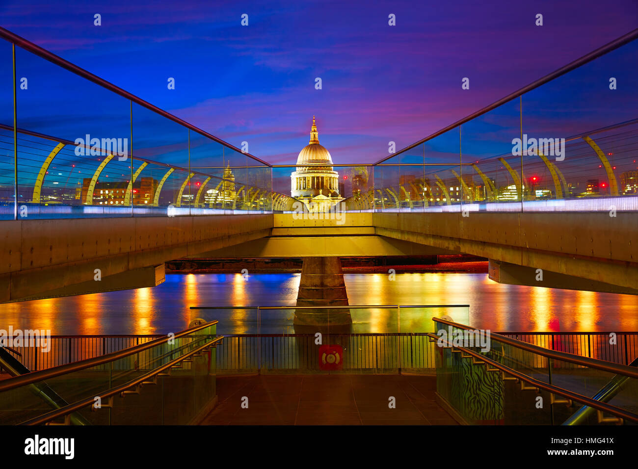 London Millennium bridge sunset skyline in UK at dusk Stock Photo - Alamy