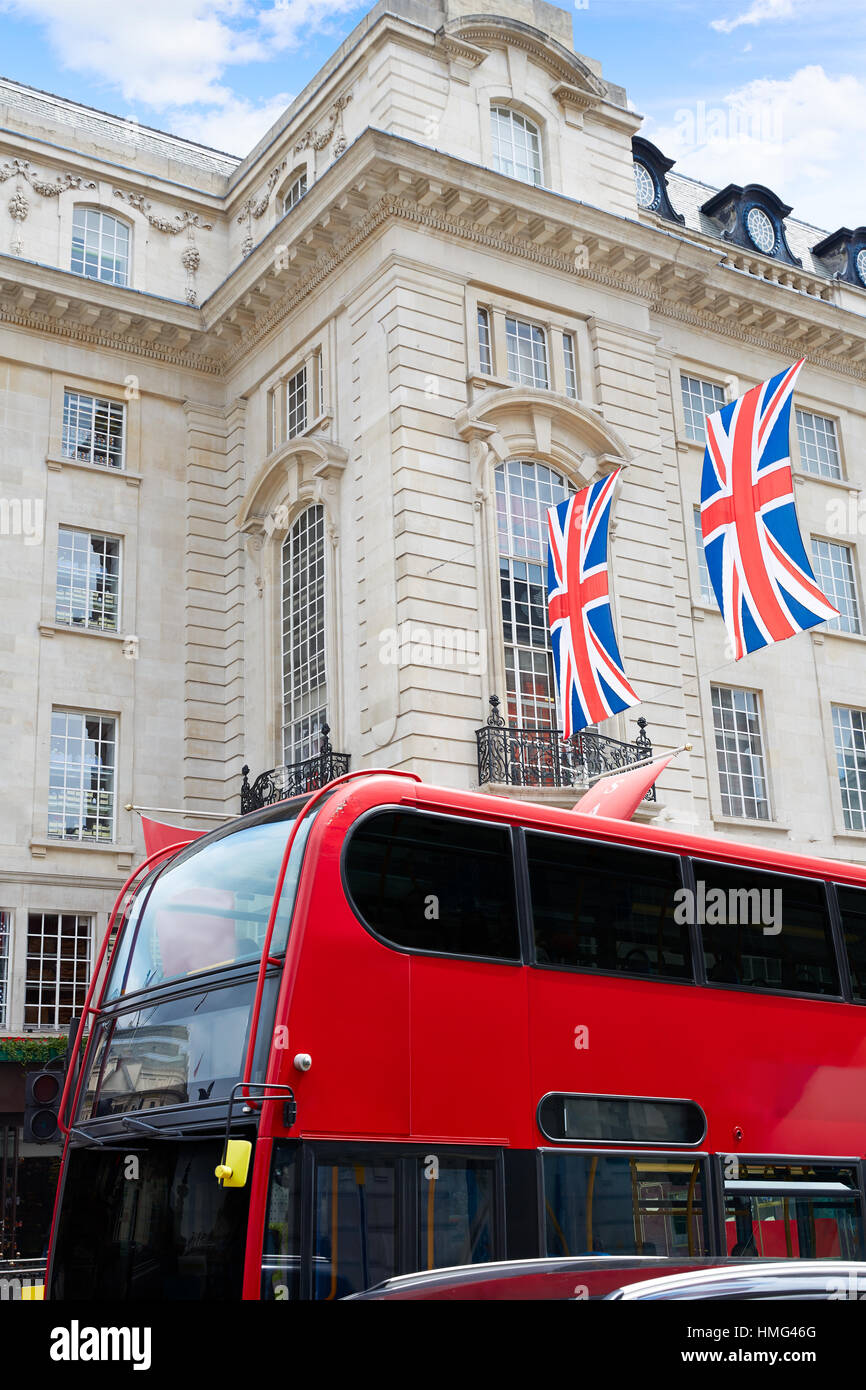 London Bus and UK flags in Piccadilly Circus England Stock Photo - Alamy