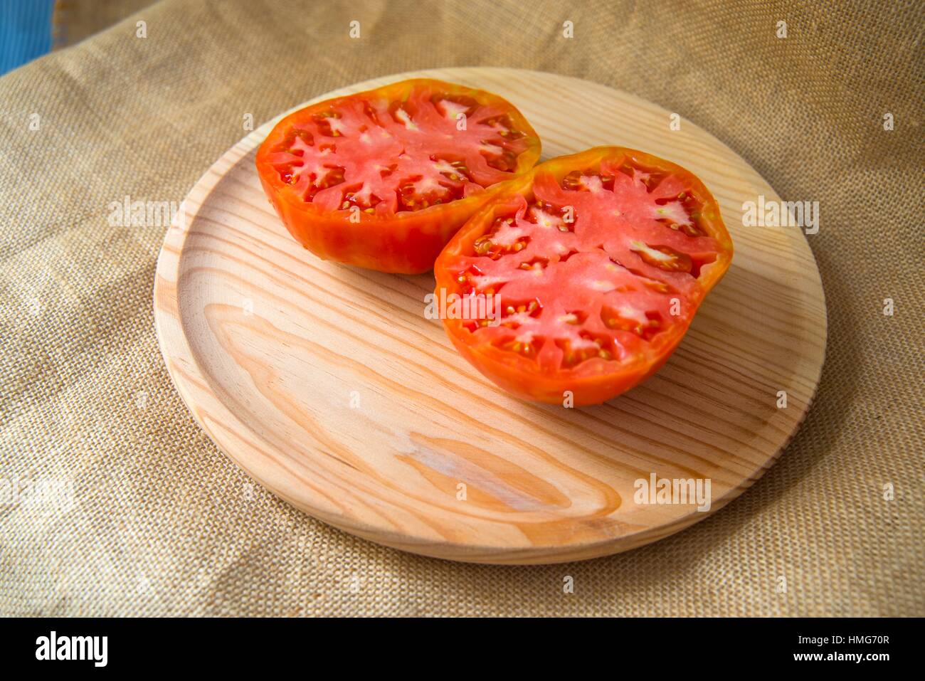 Halves cut in half tomato hi-res stock photography and images - Alamy