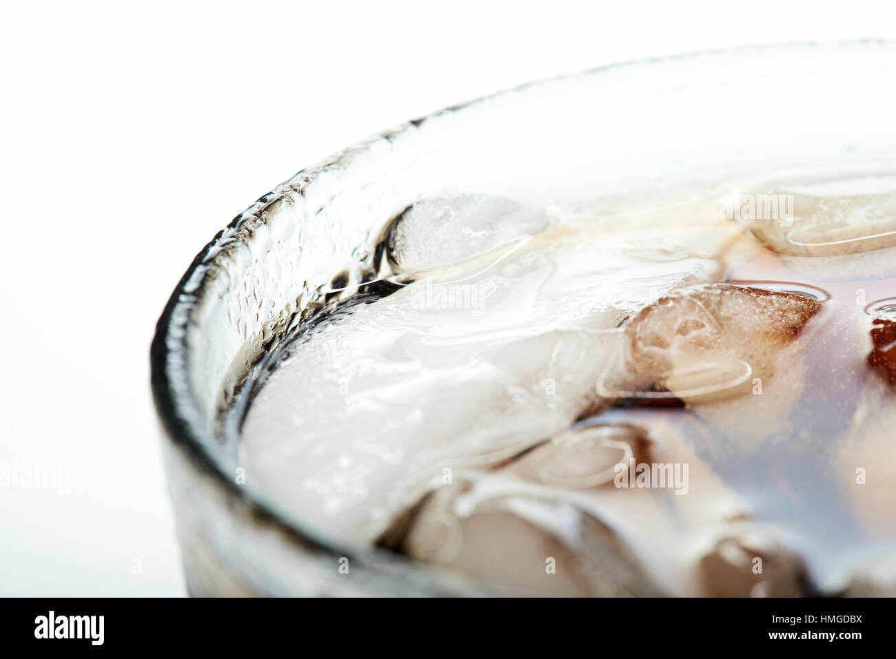 ice and soda close up in glass isolated on white Stock Photo - Alamy