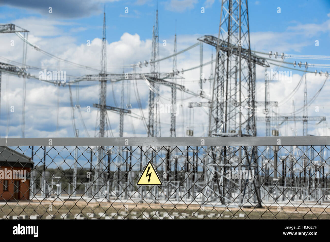 high voltage warning sign on high-voltage substation Stock Photo - Alamy