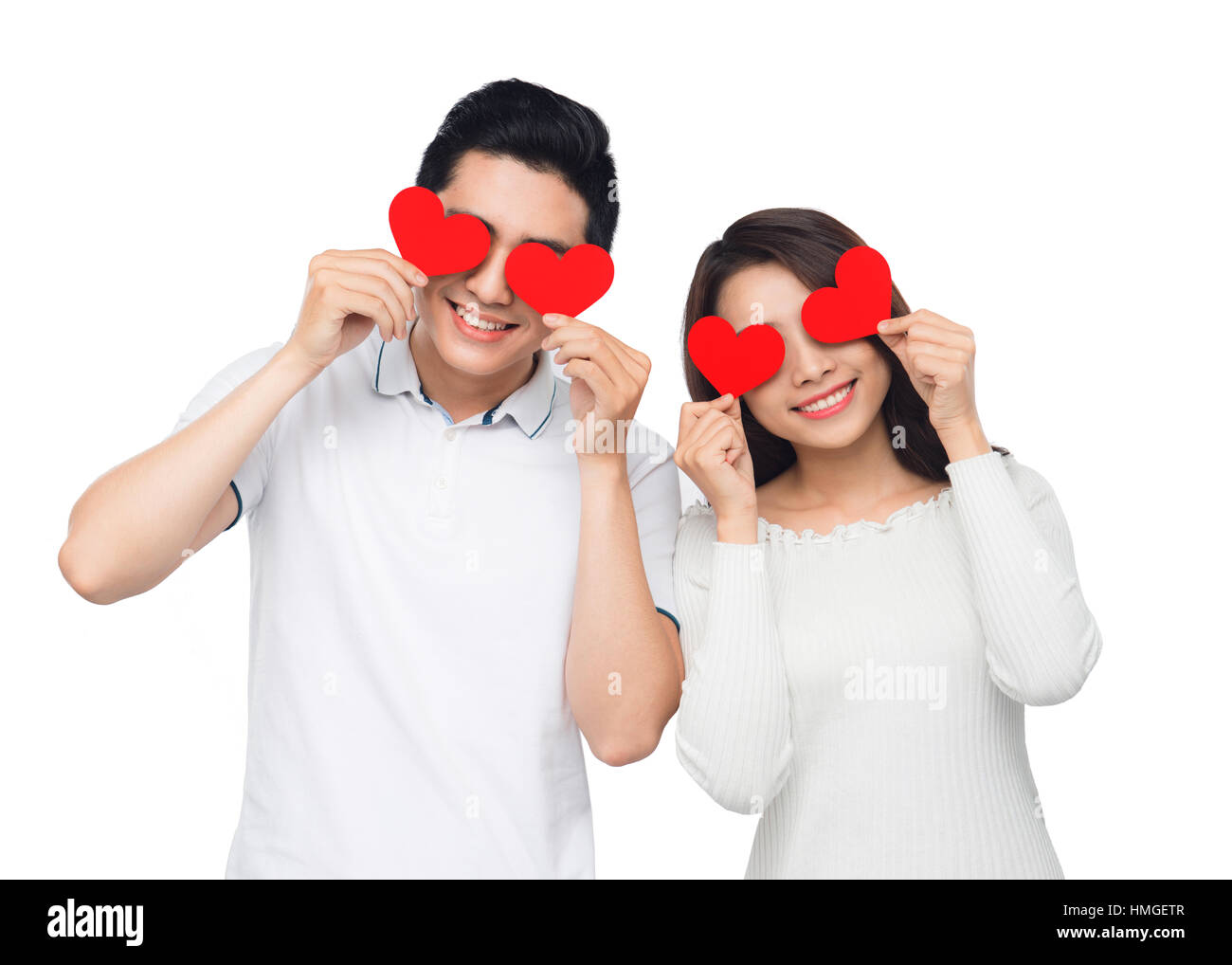 Boyfriend and girlfriend kissing with happy face expression looking ...