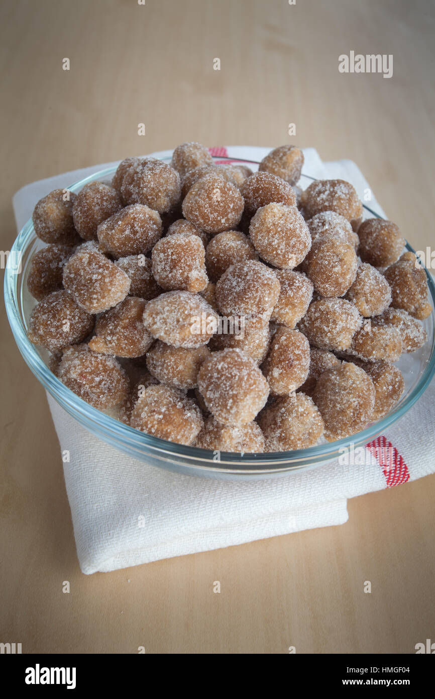 Tamarind candy in white bowl on wooden background, Candy made from ...