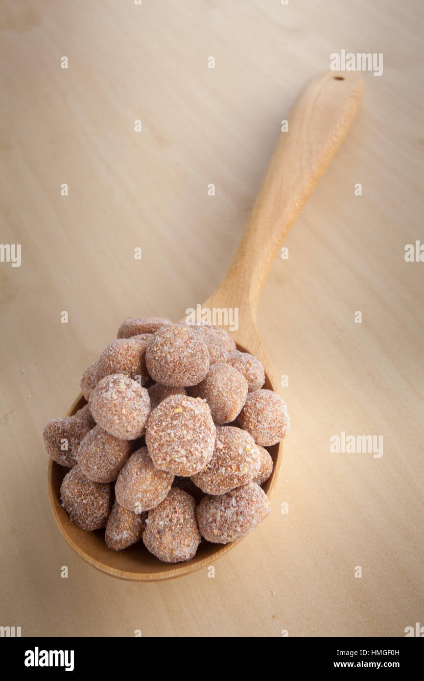 Tamarind candy on wooden background, Candy made from tamarind Stock ...