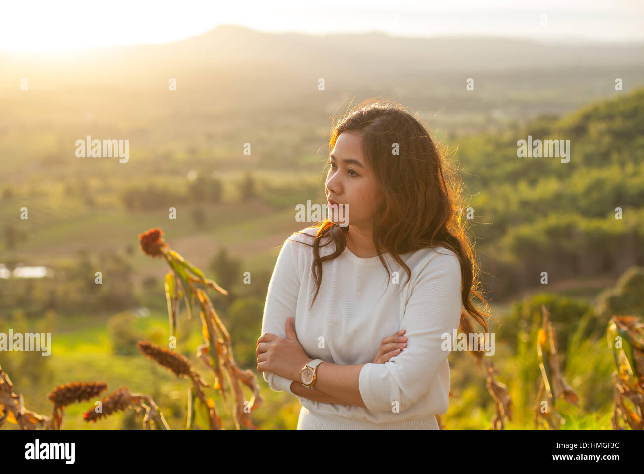 Asian beautiful girl smiling happy on warm sunshine Stock Photo - Alamy
