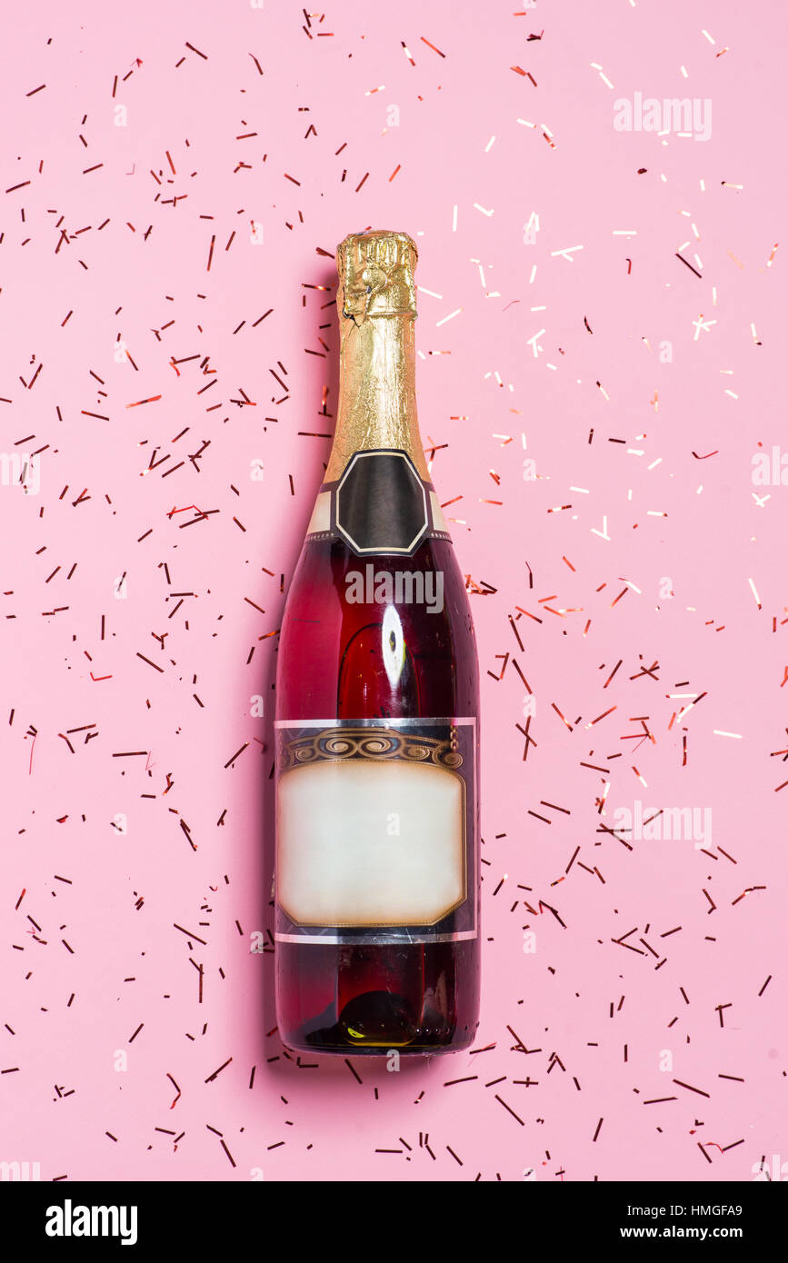 Bottle of champagne and streamers hi-res stock photography and images ...
