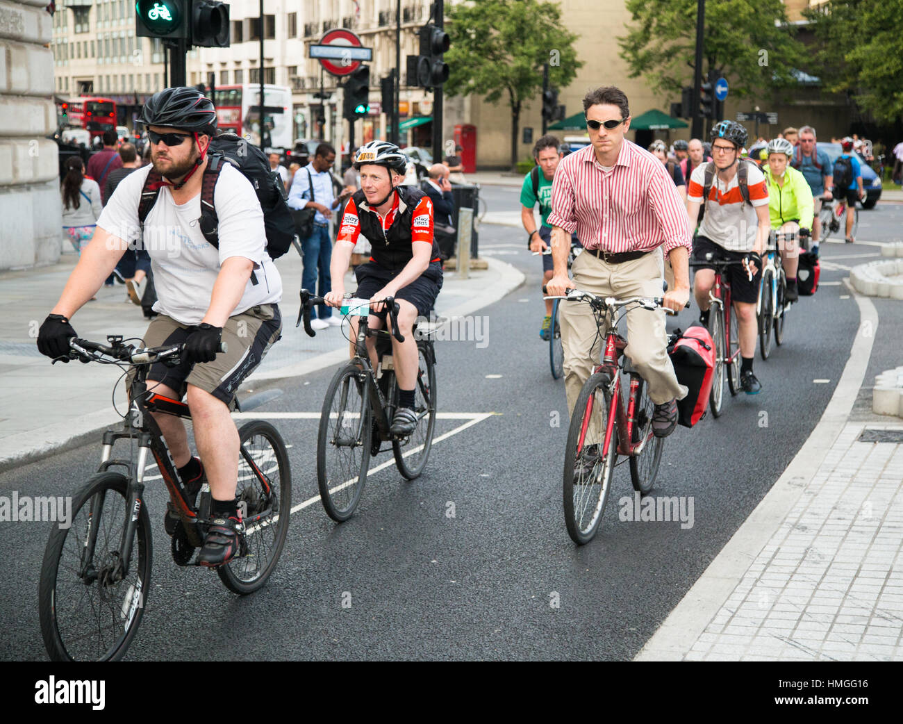 evening rush-hour cyclists ride on the north-south cycle superhighway ...