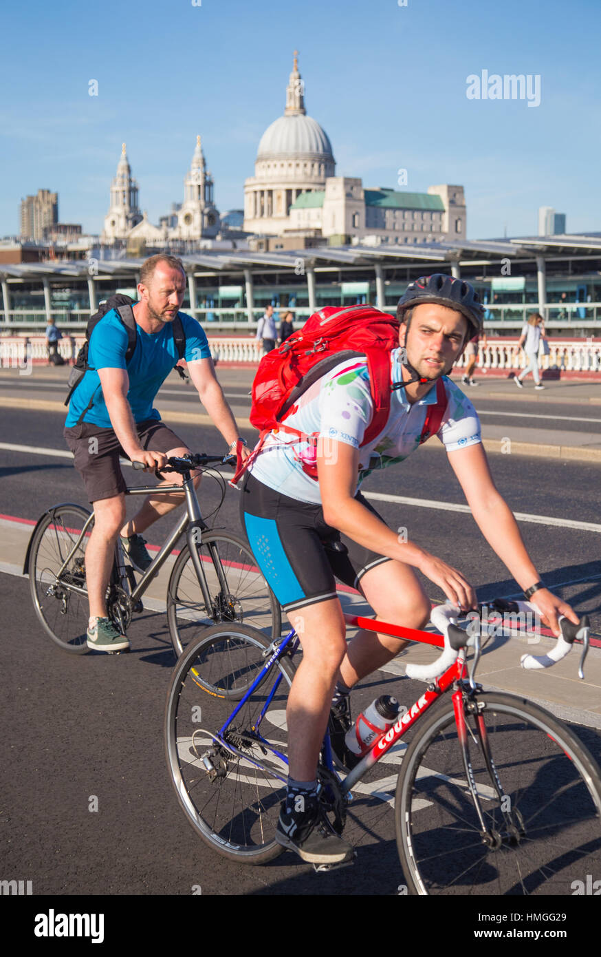 two young male cyclists on north-south cycle superhighway (CS6) on ...