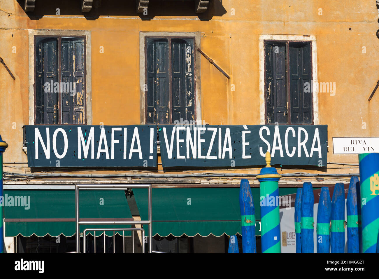 no mafia Venezia e sacra sign on building at no mafia at riva del vin ...