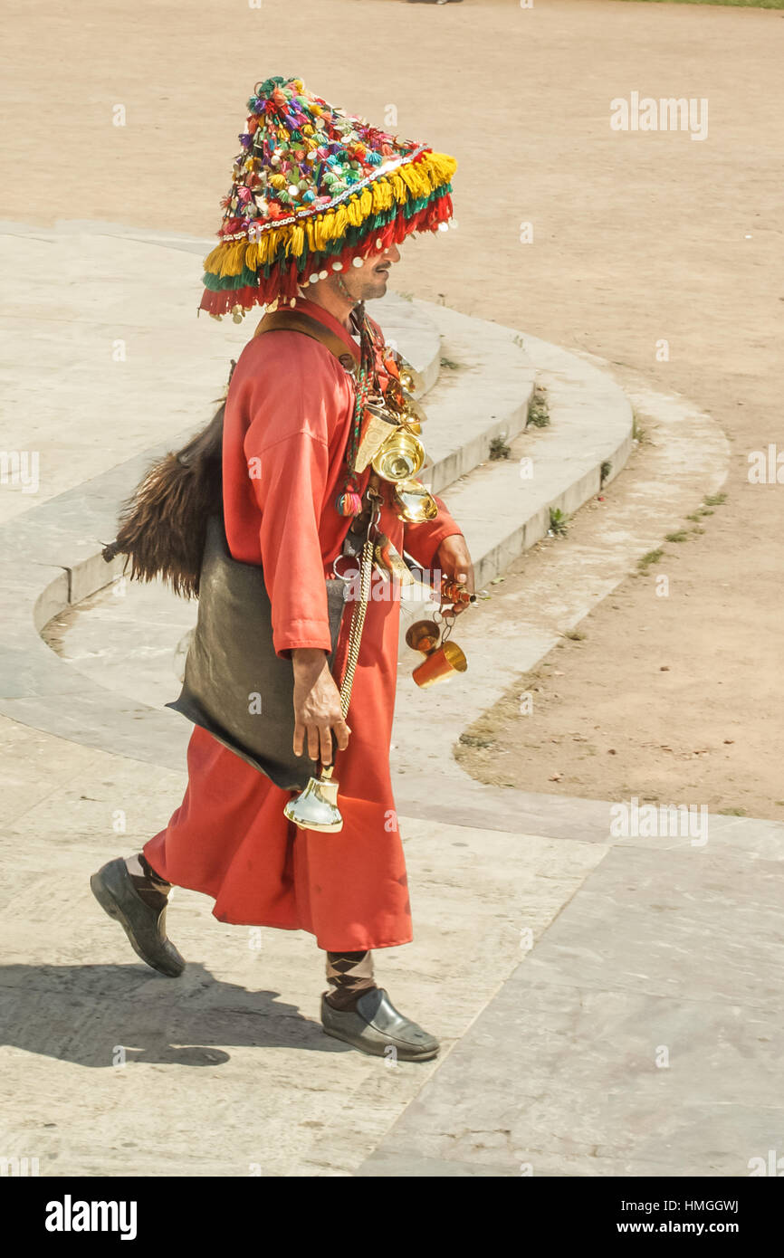 MAN WEARING BRASS CUPS & BELLS, CASABLANCA, MOROCCO - CIRCA APRIL 2015 ...