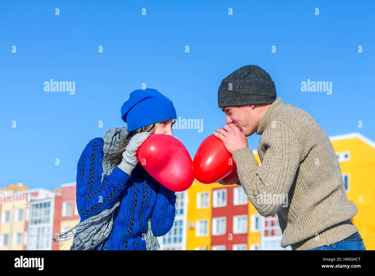 Woman inflating balloon hi-res stock photography and images - Alamy